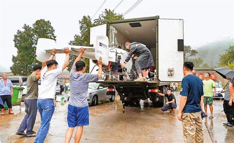 SZ firm deploys UAV rescue team to aid in flood relief_EYESHENZHEN